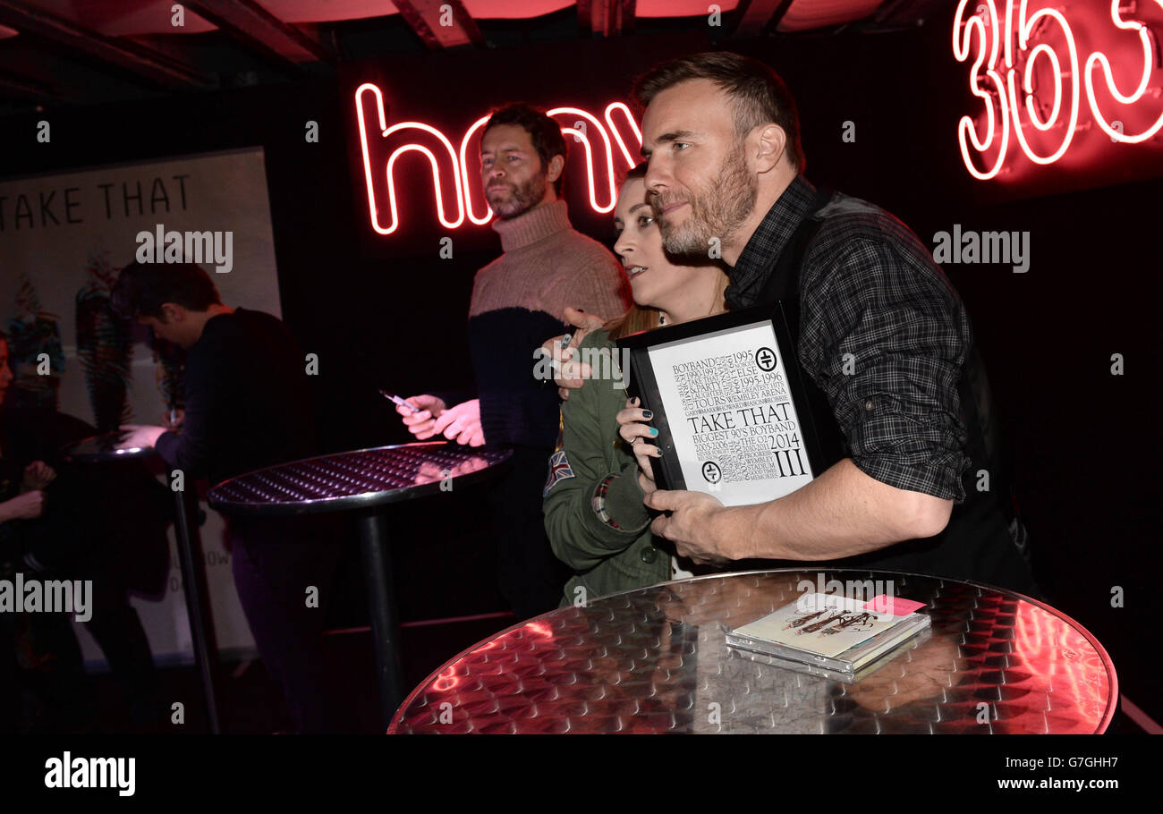 Take That Album Signing - London. Gary Barlow from Take That signs ...