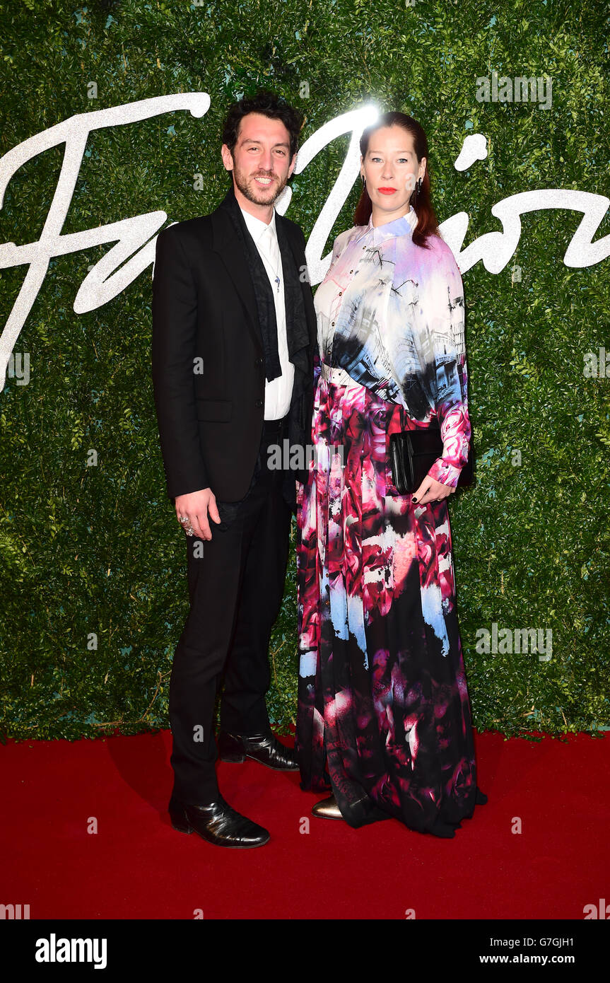 Yunus eliza higginbottom arriving at the british fashion hi-res stock ...