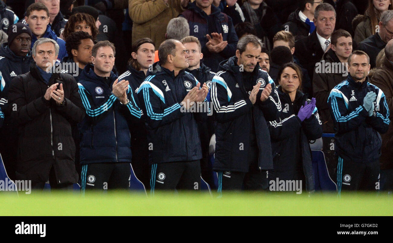 The Chelsea bench observe a minutes applause during the Barclays ...