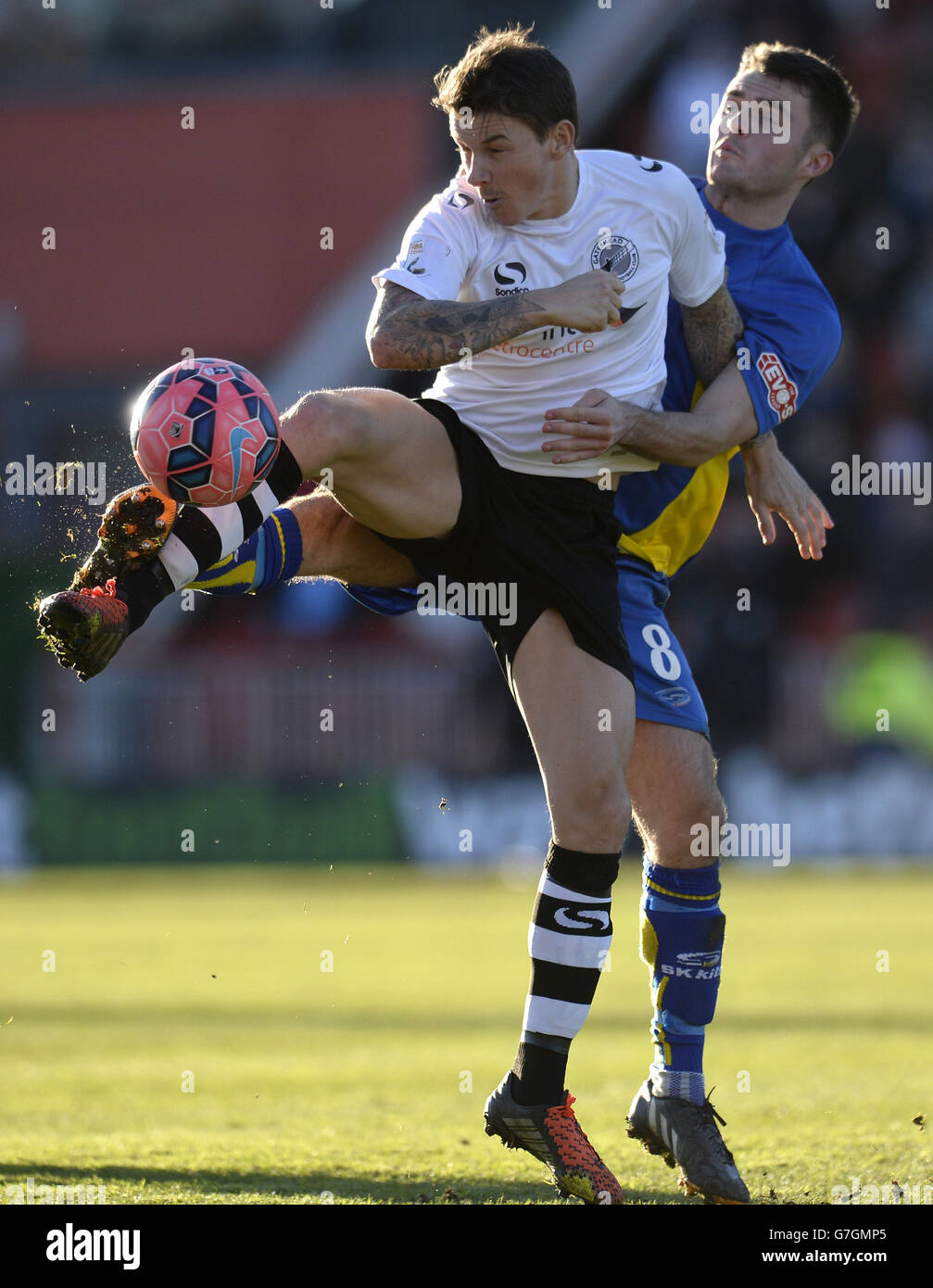 Gateshead's John Oster (left) and Warrington's Nathan Burke during the ...