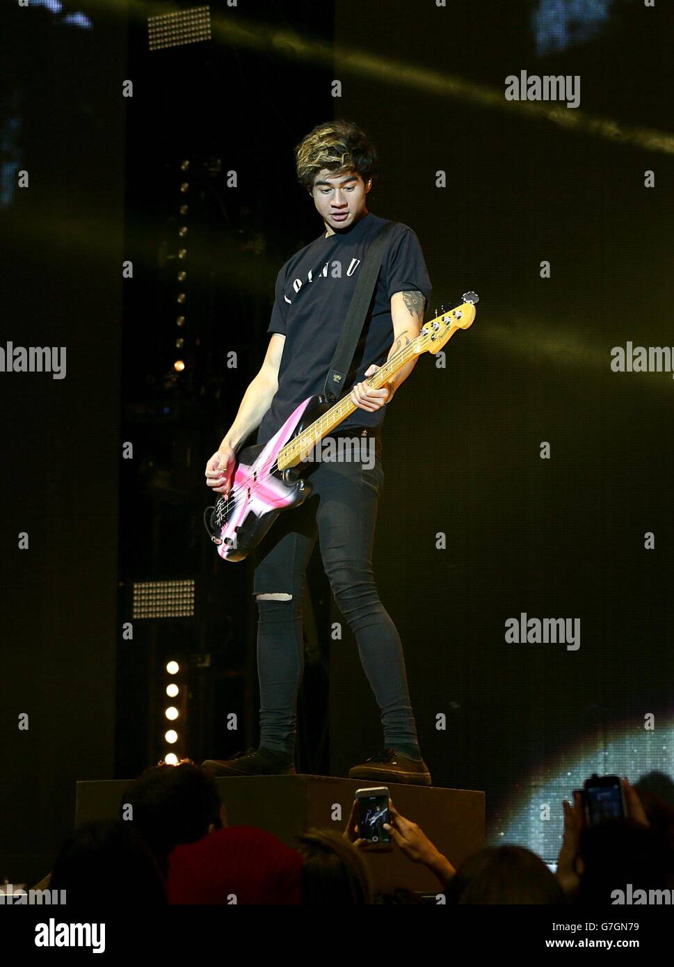 EXCLUSIVE Calum Hood of 5 Seconds of Summer live on stage during the ...