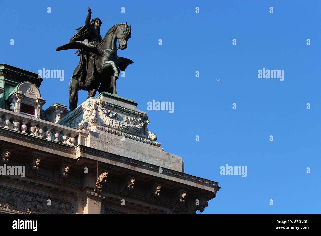 Equestrian statue on the roof of the great opera in Vienna (Austria ...