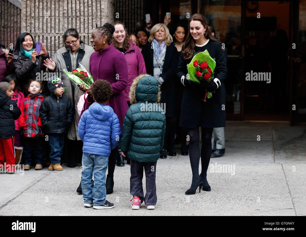 The Duchess of Cambridge greets the crowds outside as she leaves after ...
