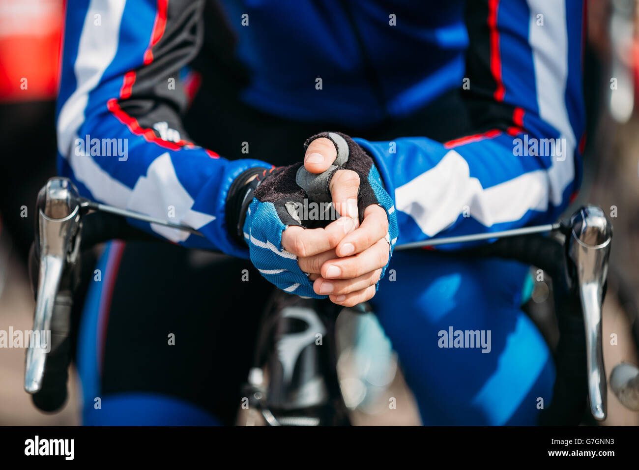 Cyclist Holding Hands On Handlebar Of Wheel Road Bike Stock Photo - Alamy