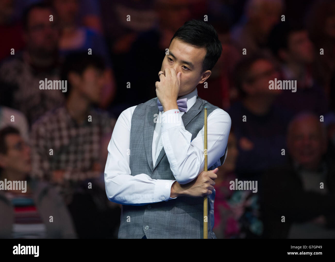 Marco Fu looks dejected during the 2014 Coral UK Championship at the ...