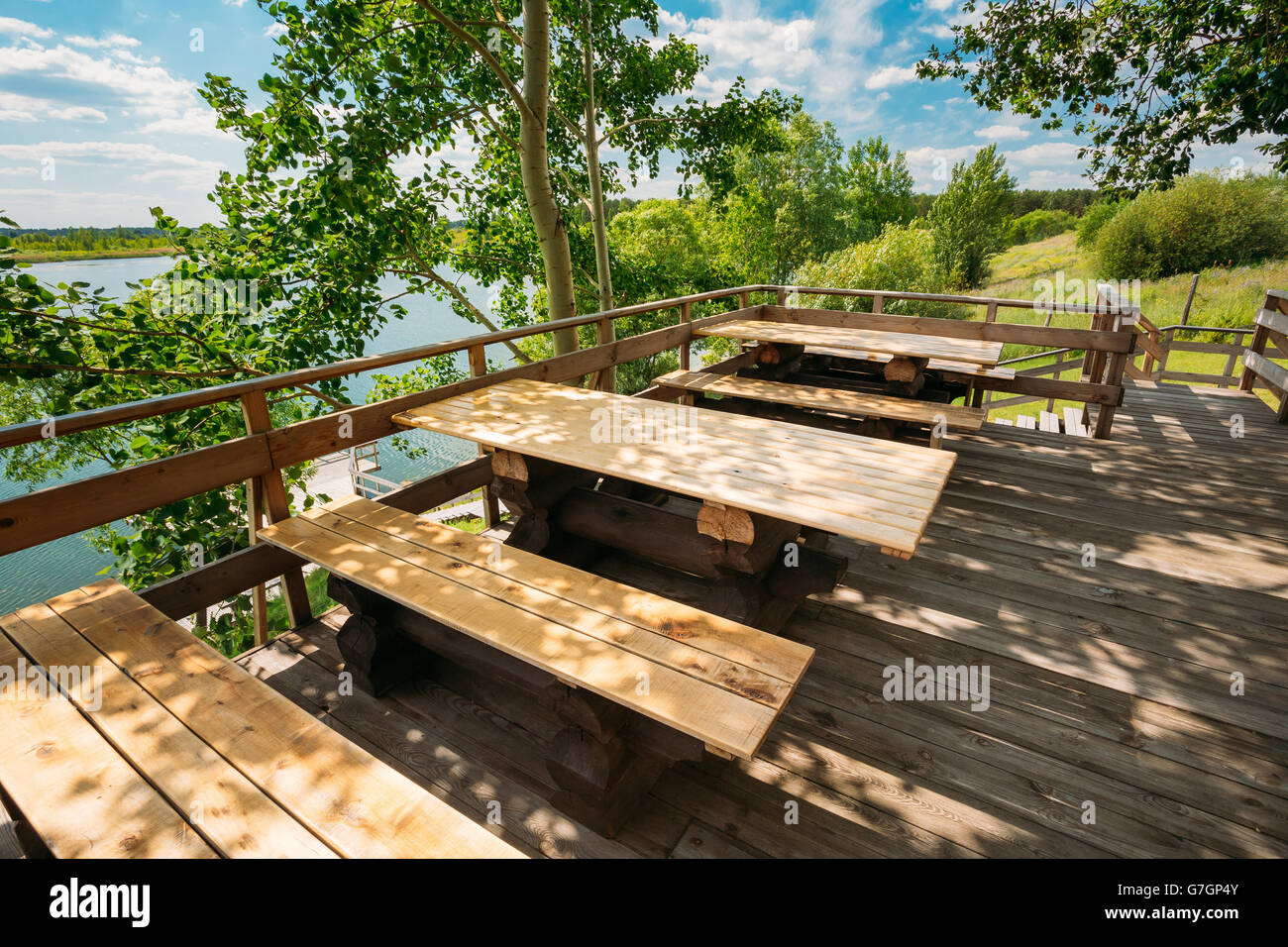 Wooden Tables And Benches In Outdoor Cafe In Nature. Sunny Summer Day ...