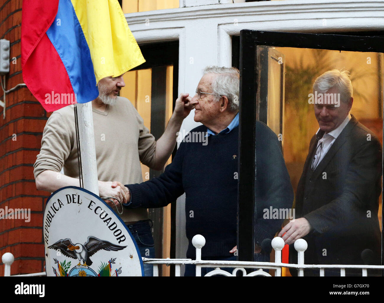 Julian Assange (left) with American linguist, philosopher and writer ...
