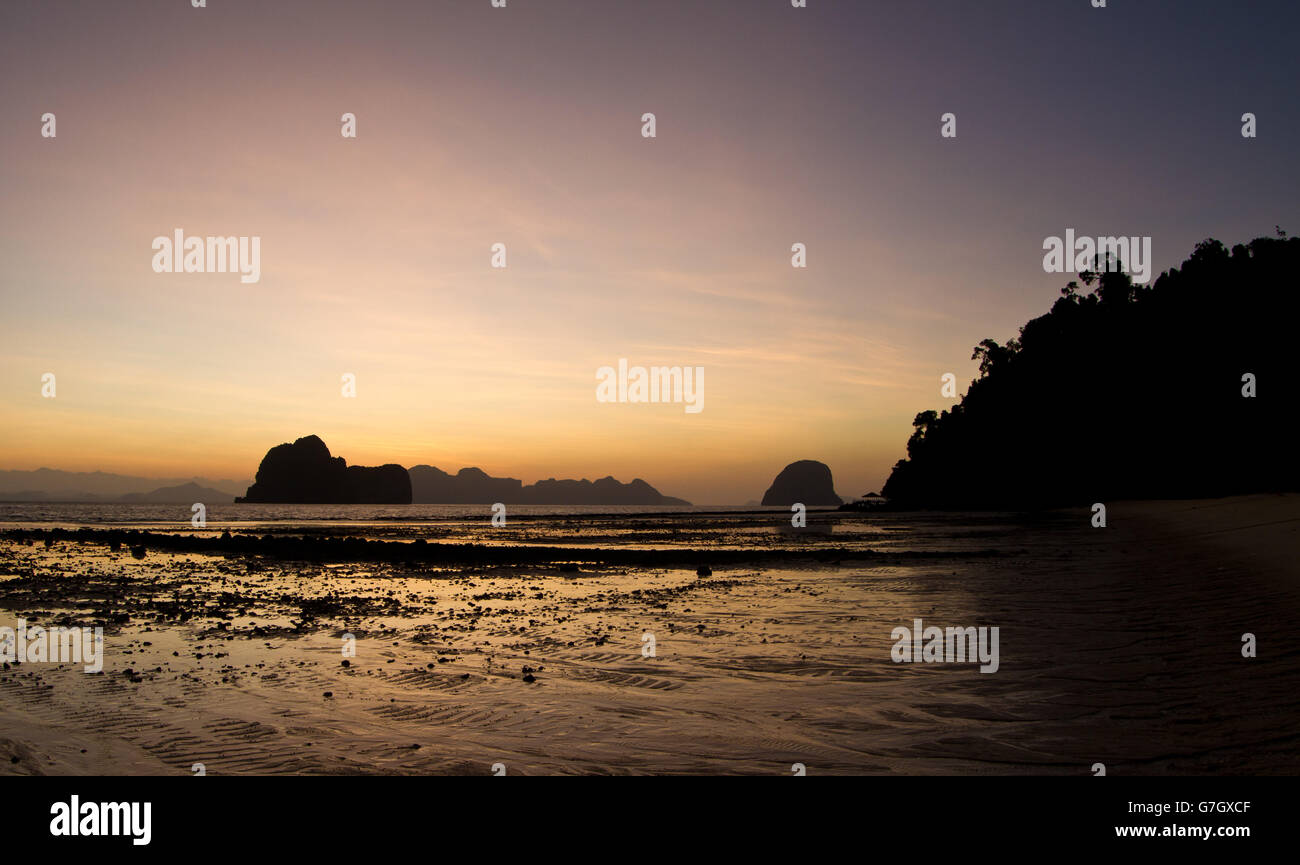 Sunset at beach on an island in Krabi Thailand Stock Photo - Alamy