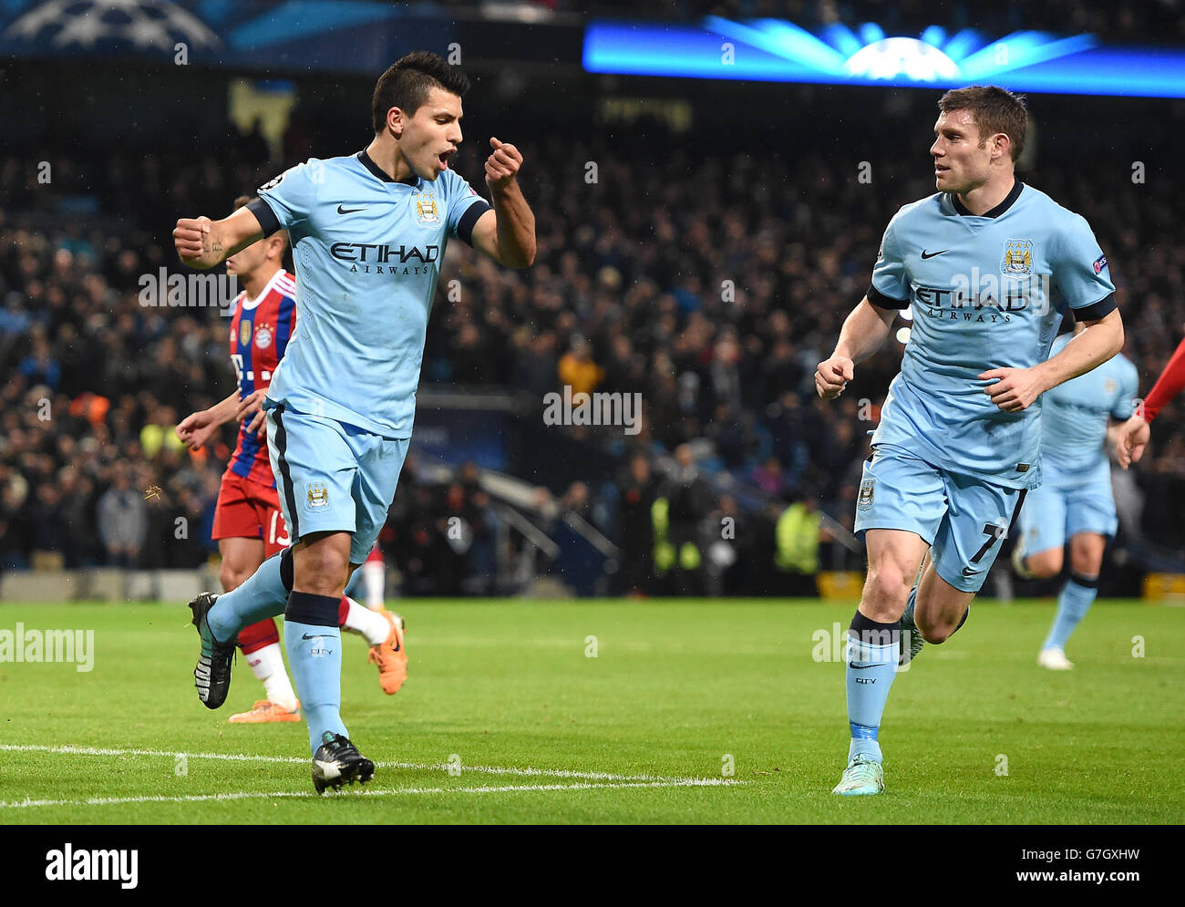 Manchester Citys Sergio Aguero Celebrates With James Milner After