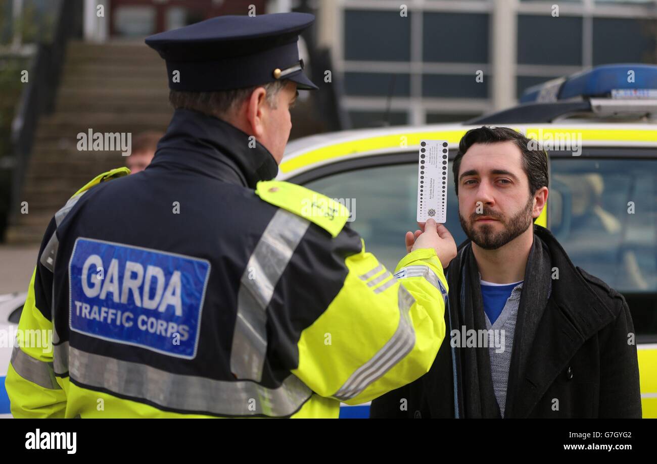 Actor Jonathan Walsh is given a pupil dilation test by a Garda at the ...