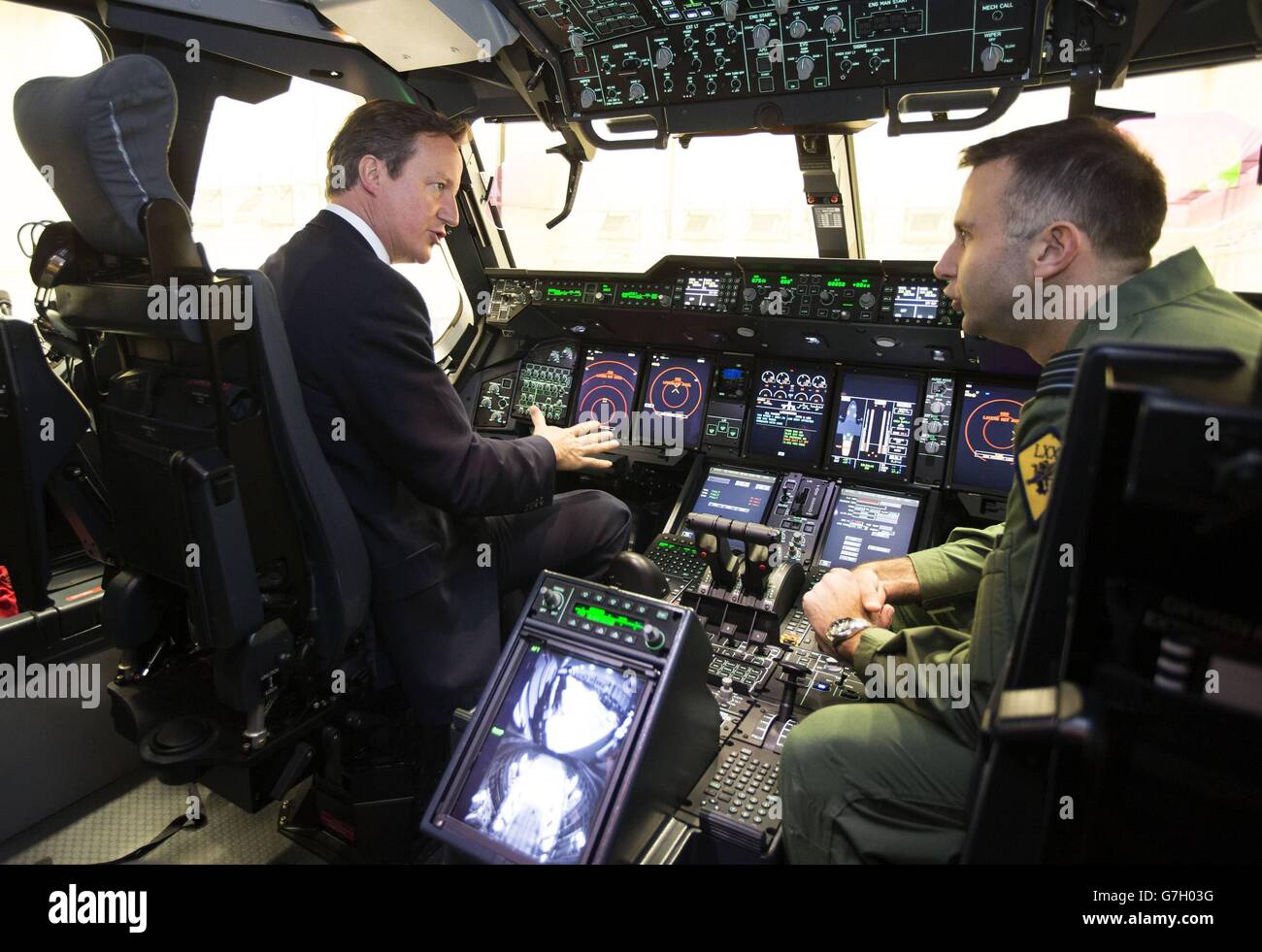 Prime Minister David Cameron views the flight deck of a newly delivered ...