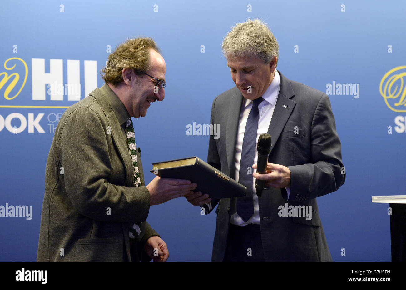 John Inverdale presents shortlisted author Simon Inglis with a leather ...