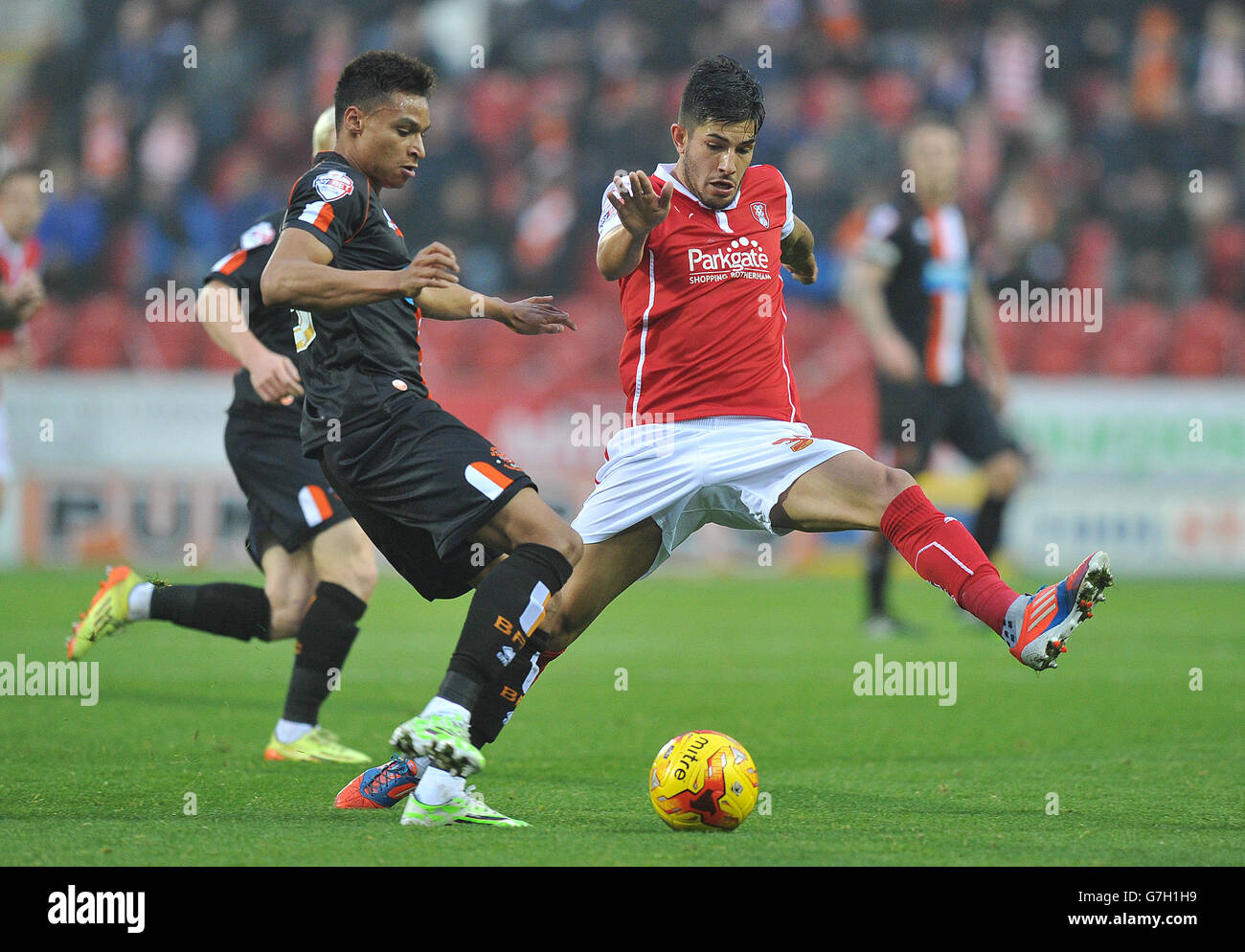 Blackpool's Jacob Murphy (left) and Rotherham United's Emmanuel Ledesma ...