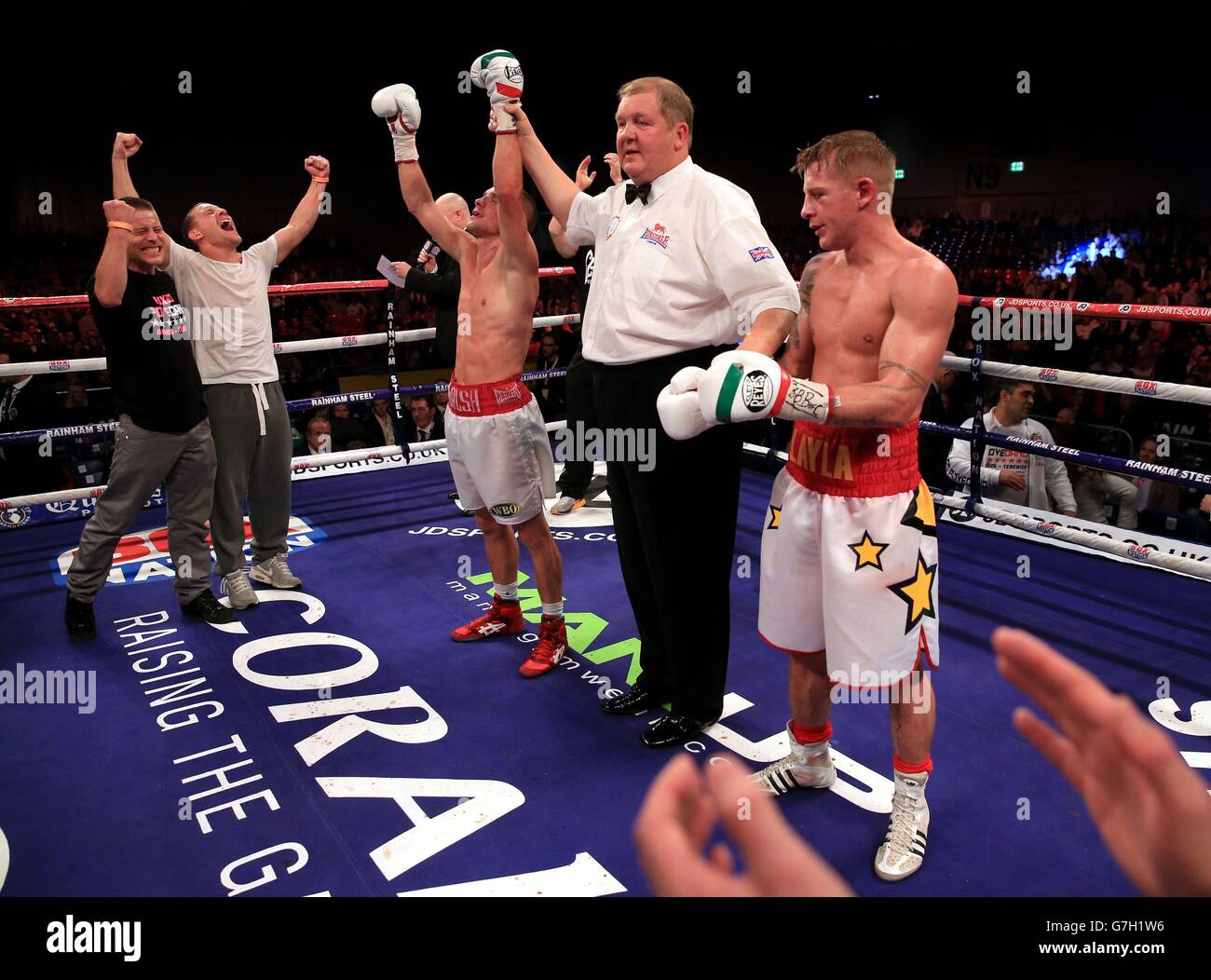 Liam Walsh (right) celebrates beating Gary Sykes on points in their ...