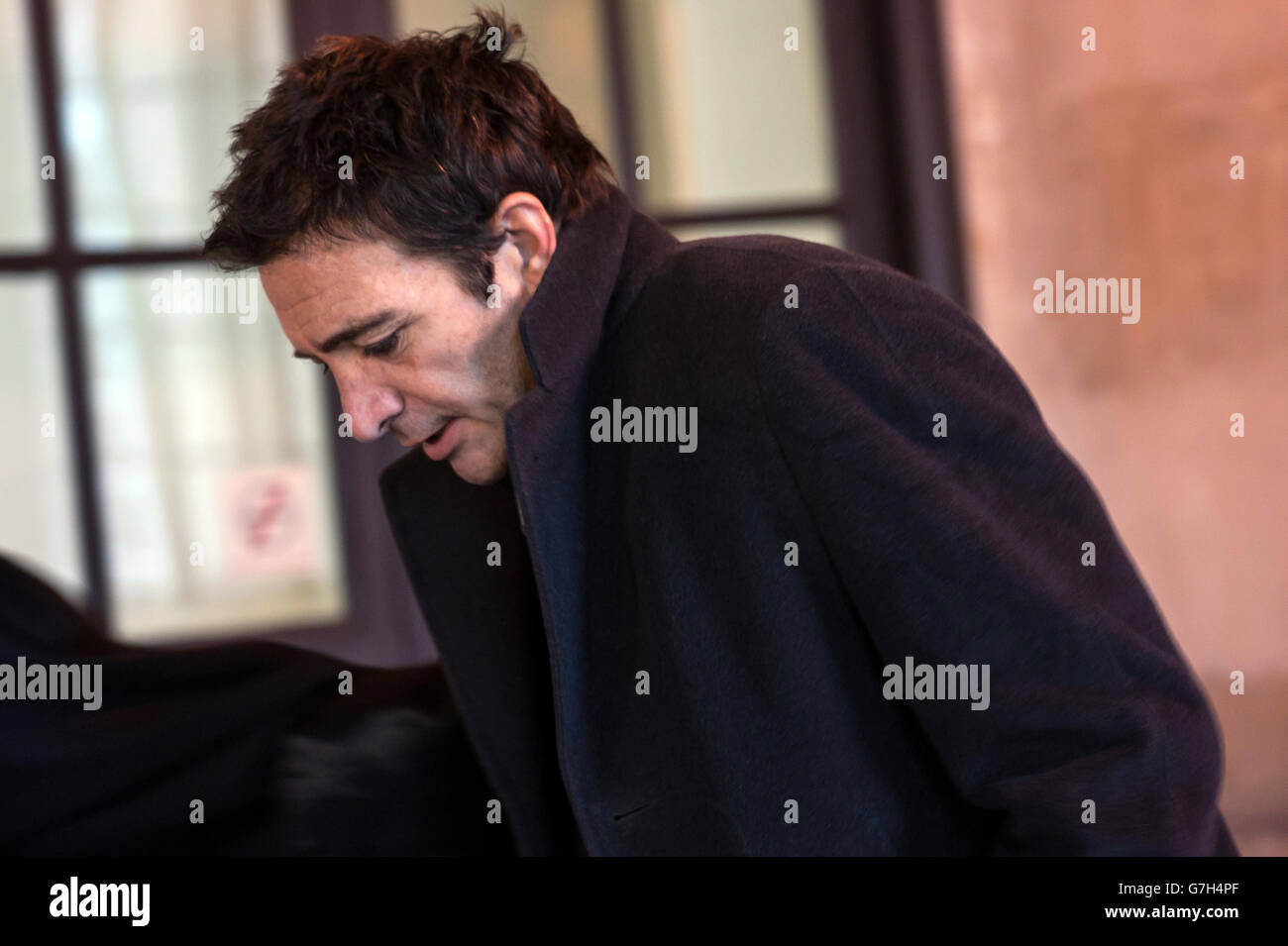 Ian Griffin leaves Paris' Criminal Court, Paris, as a verdict was ...