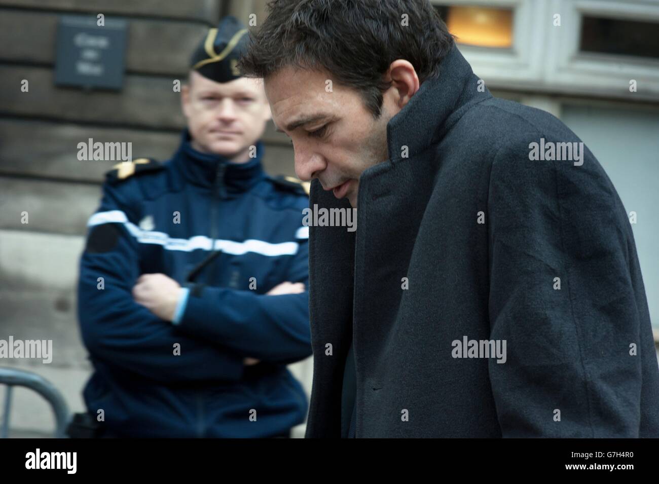Ian Griffin leaves Paris' Criminal Court, Paris, as a verdict was ...