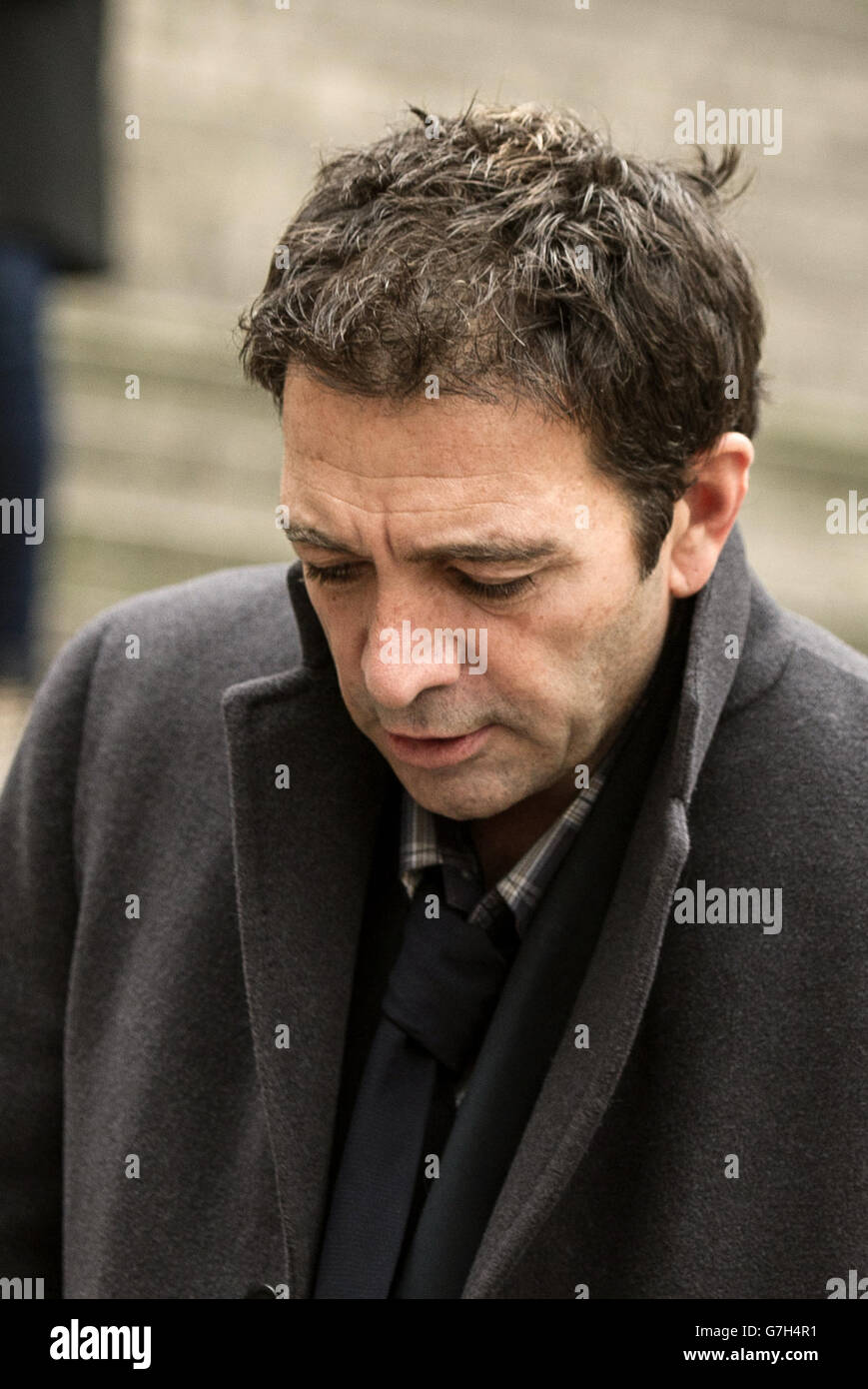 Ian Griffin leaves Paris' Criminal Court, Paris, as a verdict was ...