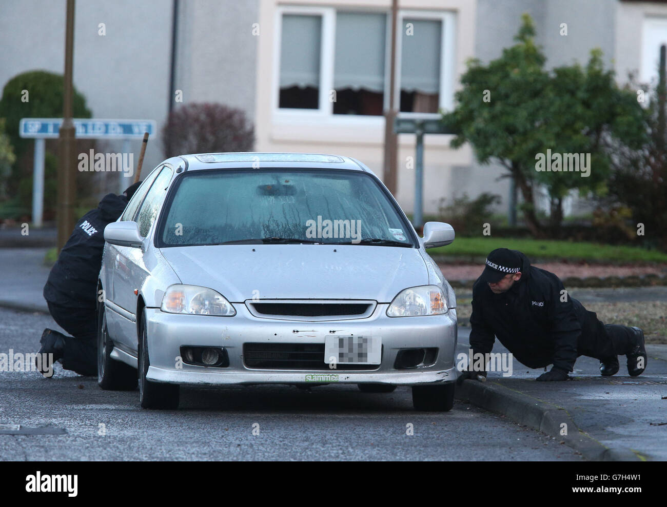 Police search the area in springfield drive hi-res stock photography ...