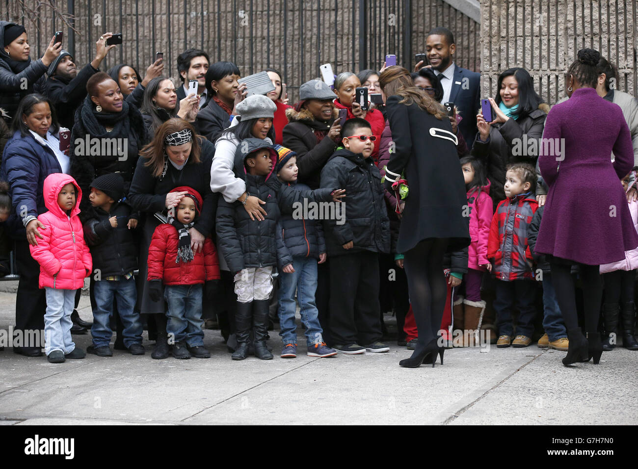 The Duchess of Cambridge greets the crowds outside as she leaves after ...