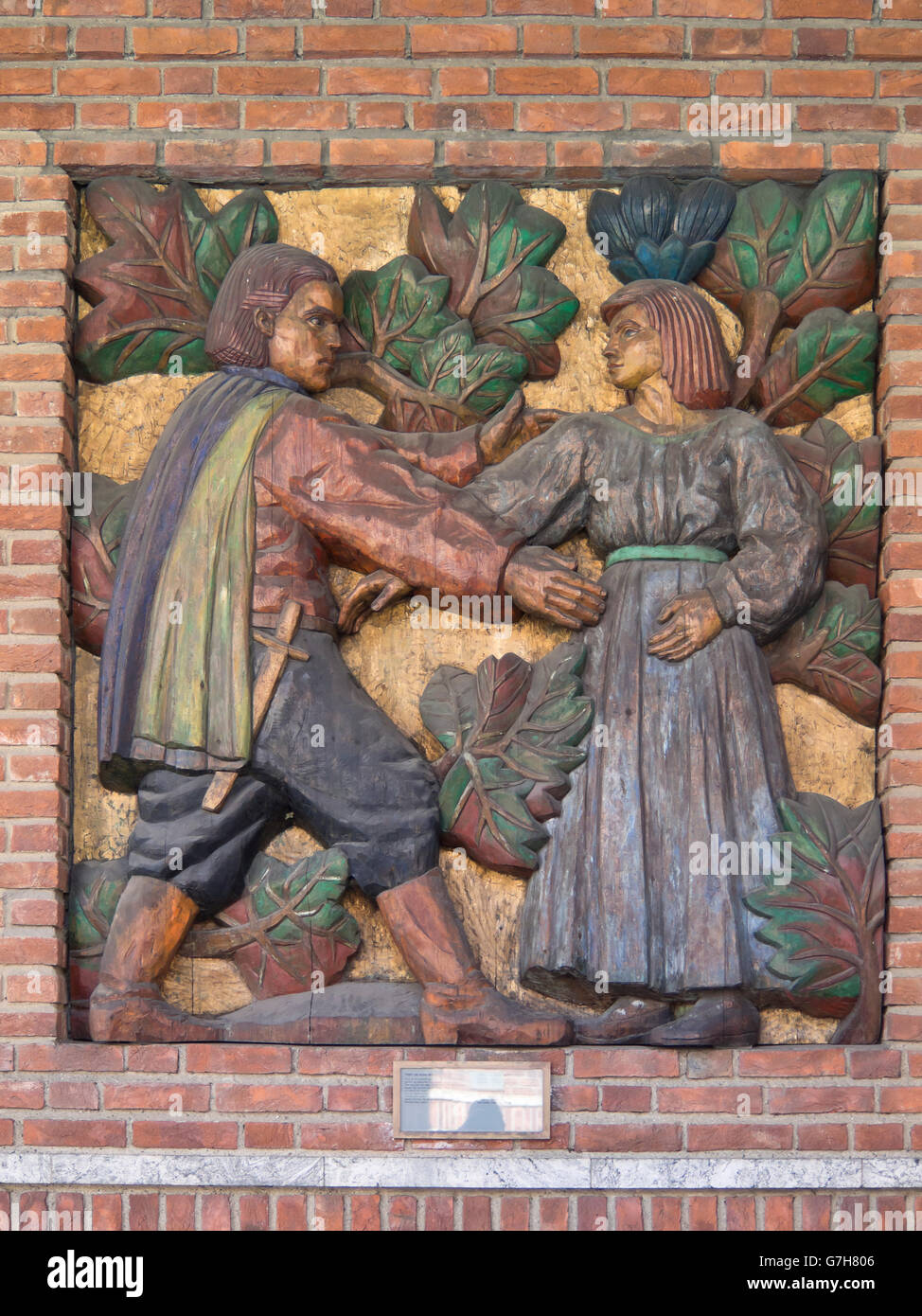 Woodcarving relief on the exterior facade of the Oslo City hall in ...