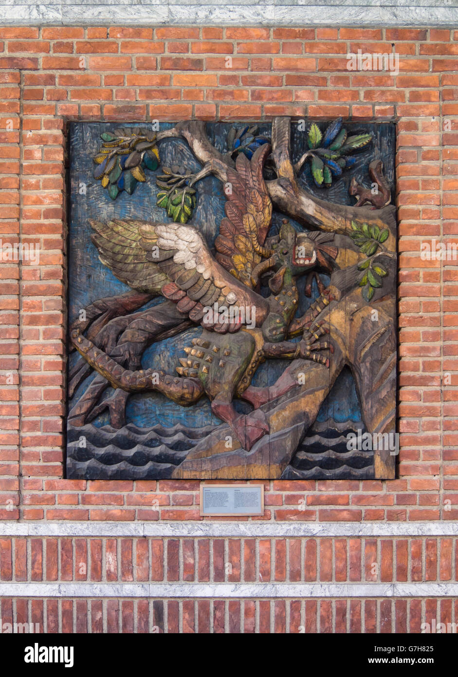 Woodcarving relief on the exterior facade of the Oslo City hall by ...