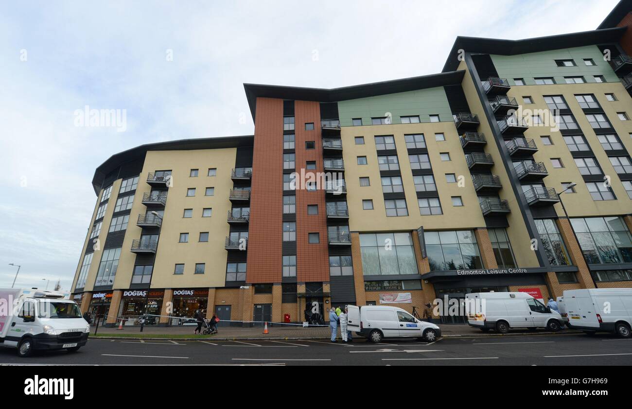 Police and forensic officers at the murder scene at a block of flats at ...
