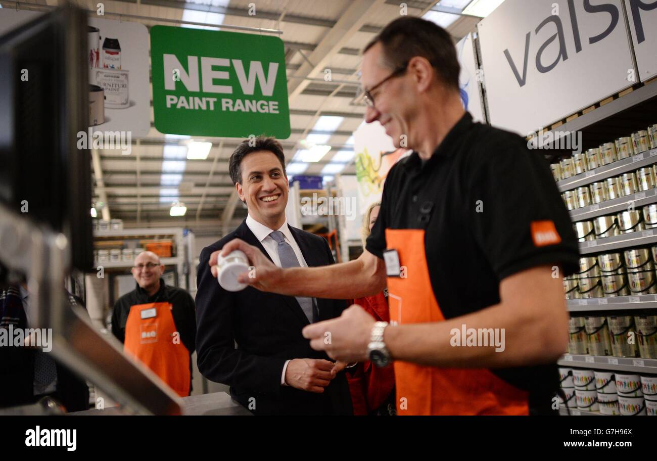 Labour leader Ed Miliband has a demonstration on how to mix paint by ...