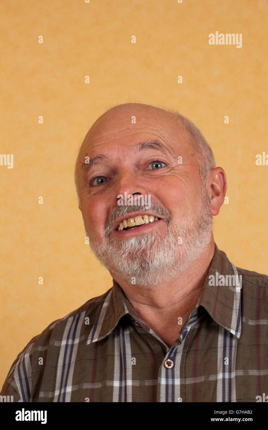Elderly man, 59, laughing Stock Photo - Alamy