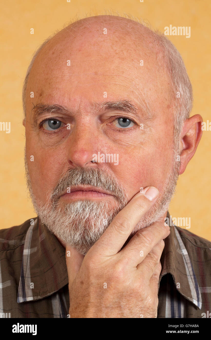 Elderly man, 59, pensive Stock Photo - Alamy