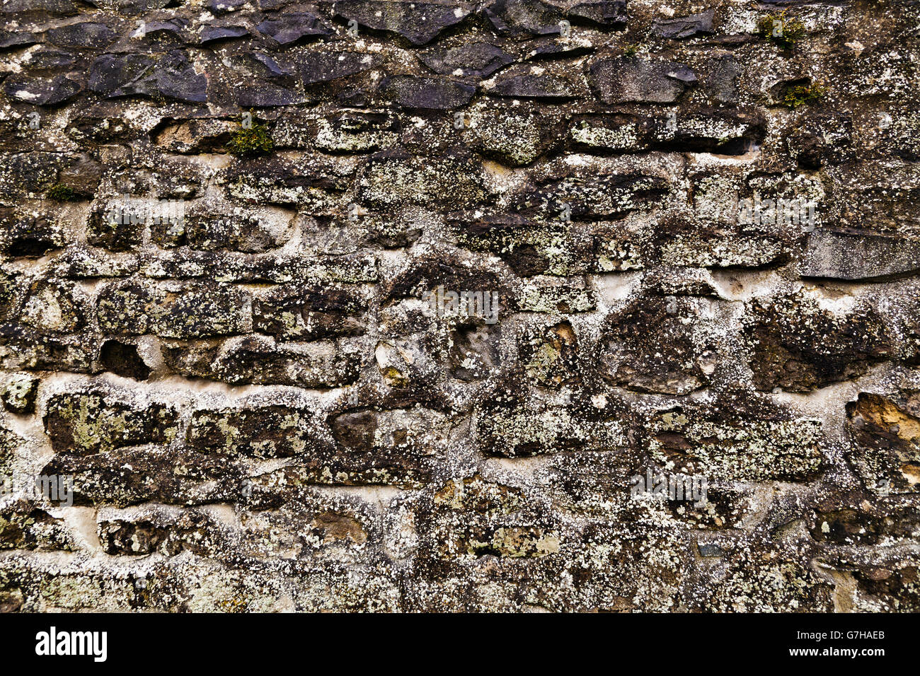 Weathered stone wall Stock Photo - Alamy