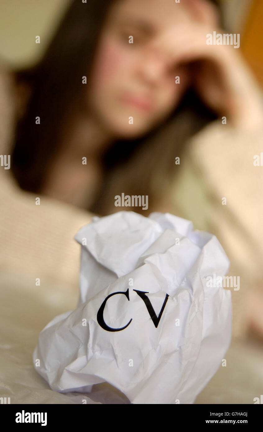 Crumpled sheet of paper, "CV" for curriculum vitae written on it, woman ...