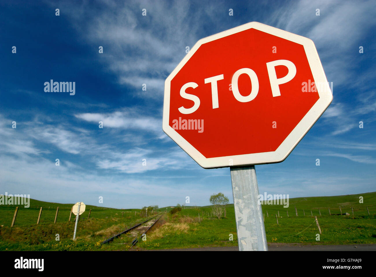 Stop sign in rural landscape Stock Photo - Alamy