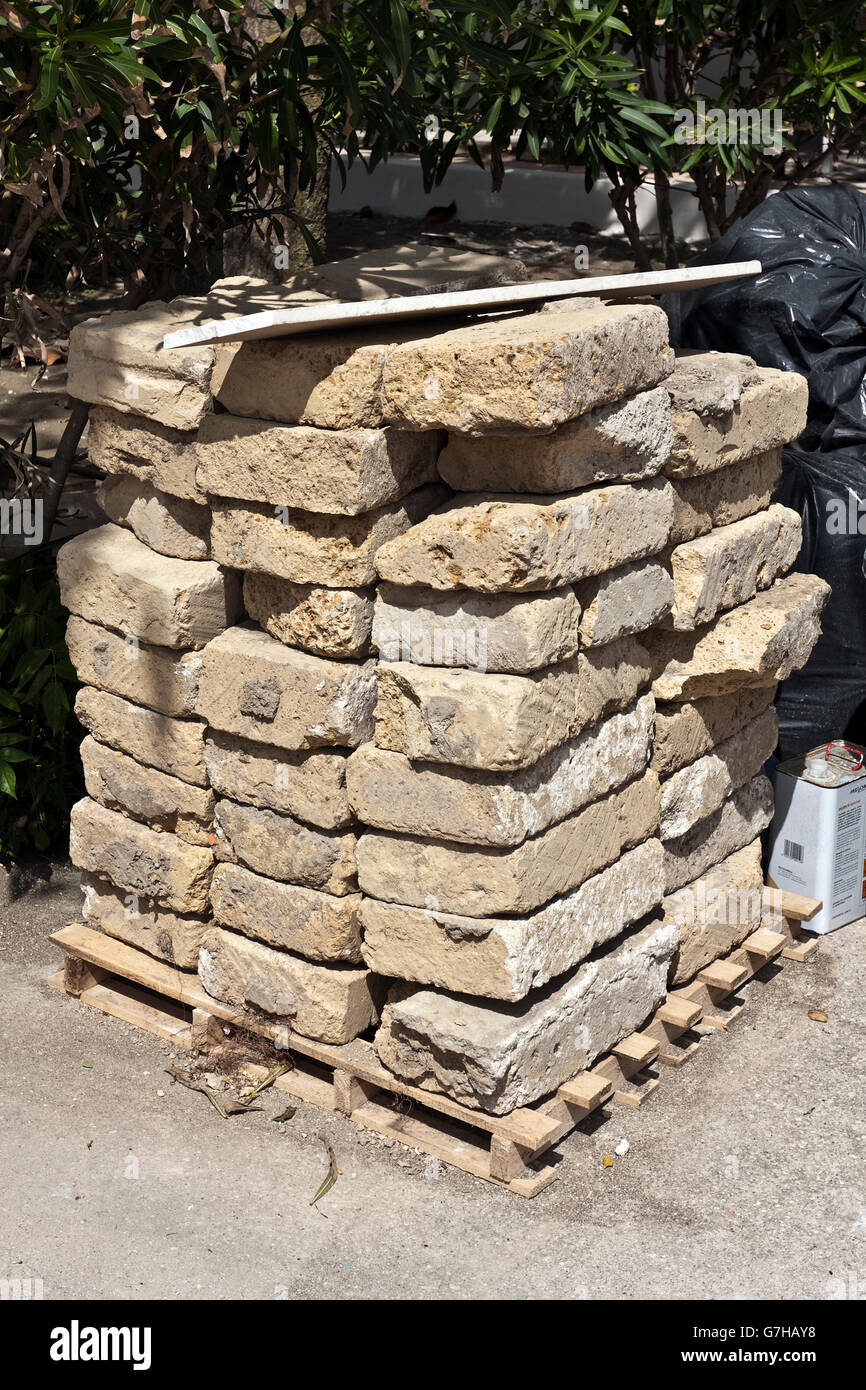 Stack of tuff bricks, construction material Stock Photo - Alamy