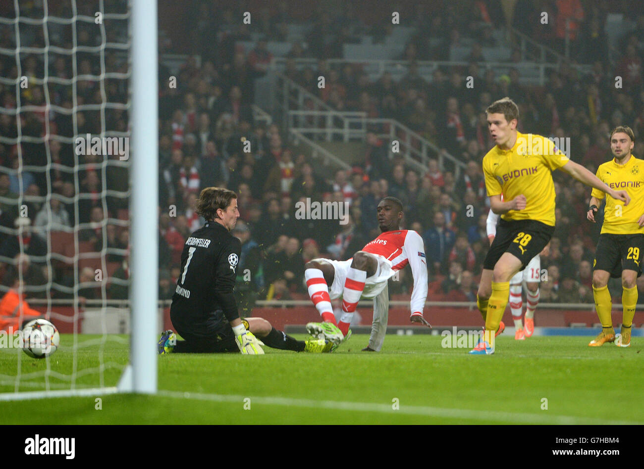 Arsenal's Yaya Sanogo scores his side's first goal during the UEFA ...