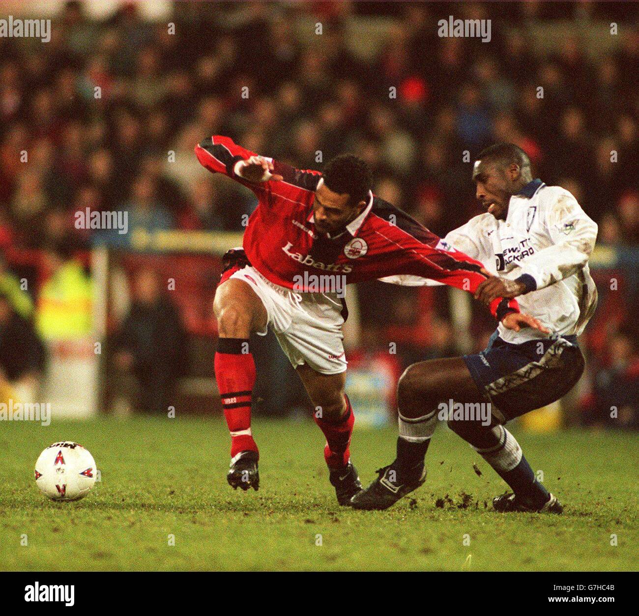 Jason Lee, Nottingham Forest is pulled back by Sol Campbell, Tottenham ...