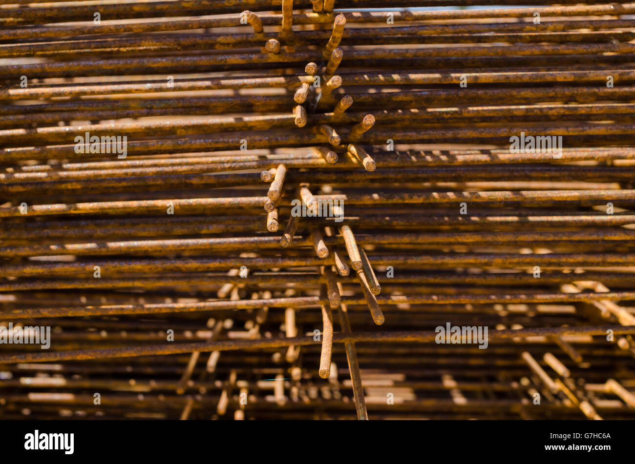 Steel mesh hole in close-up. Screw thread steel bar framework in the ...