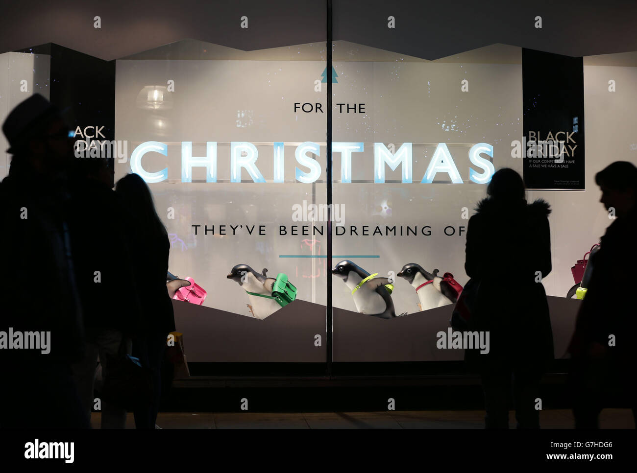 A John Lewis Christmas window display showing a Black Friday sign, on ...