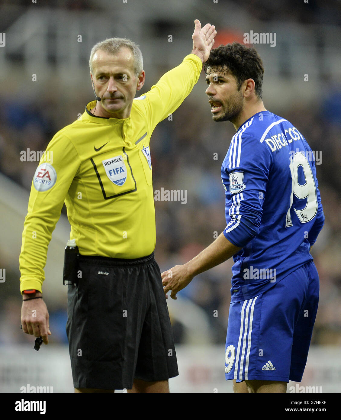 Referee Martin Atkinson (left) with Chelsea's Diego Costa during of the ...