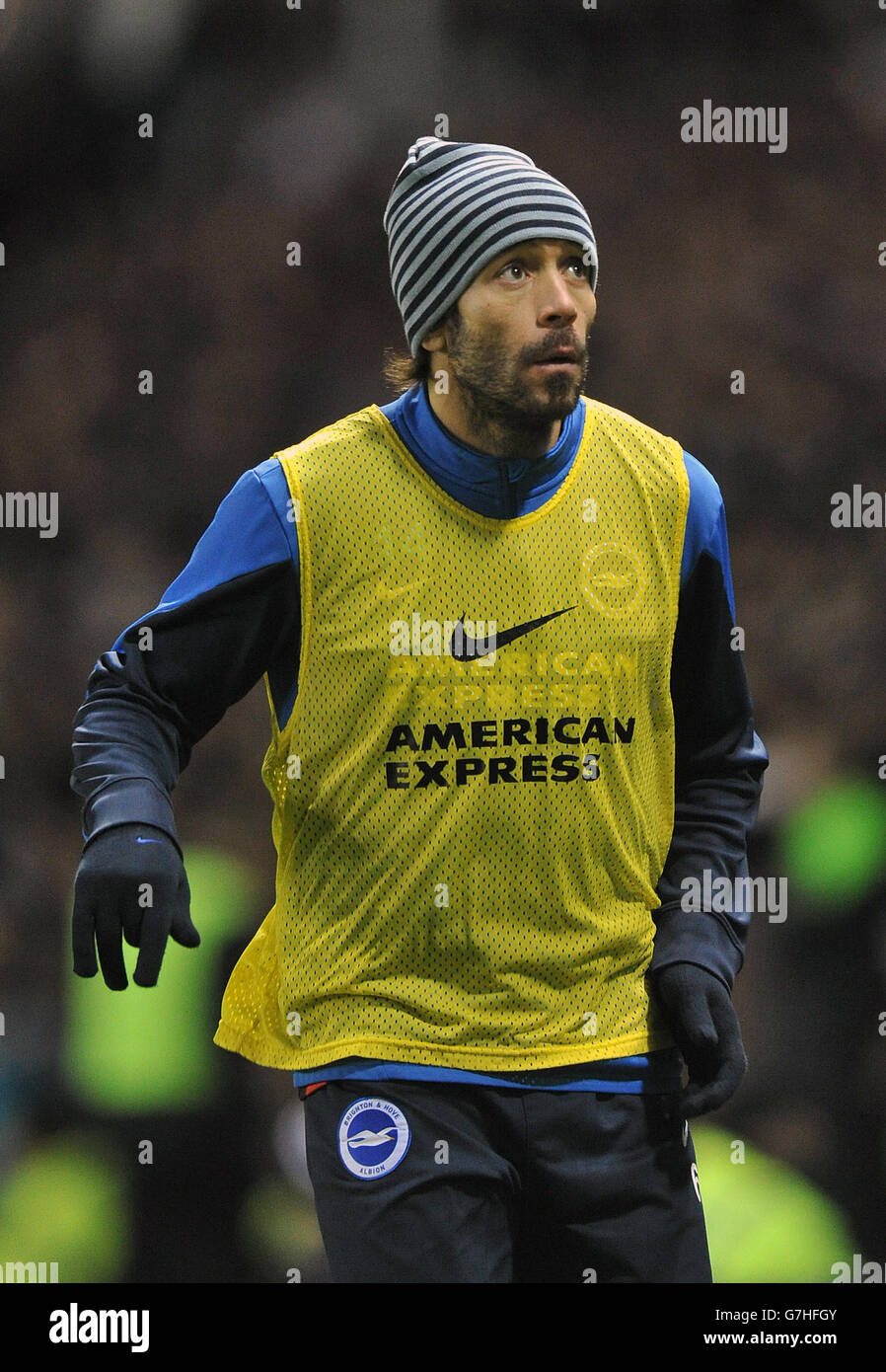 Brighton and Hove Albion's Dale Stephens warms up wearing his hat to ...