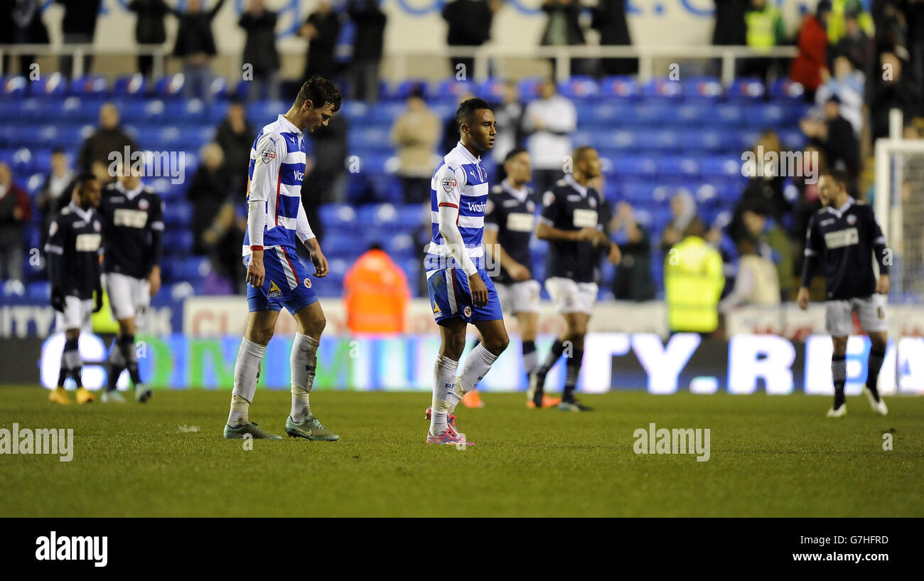 Reading's Jake Cooper (left) and Jordan Obita look dejected as they ...