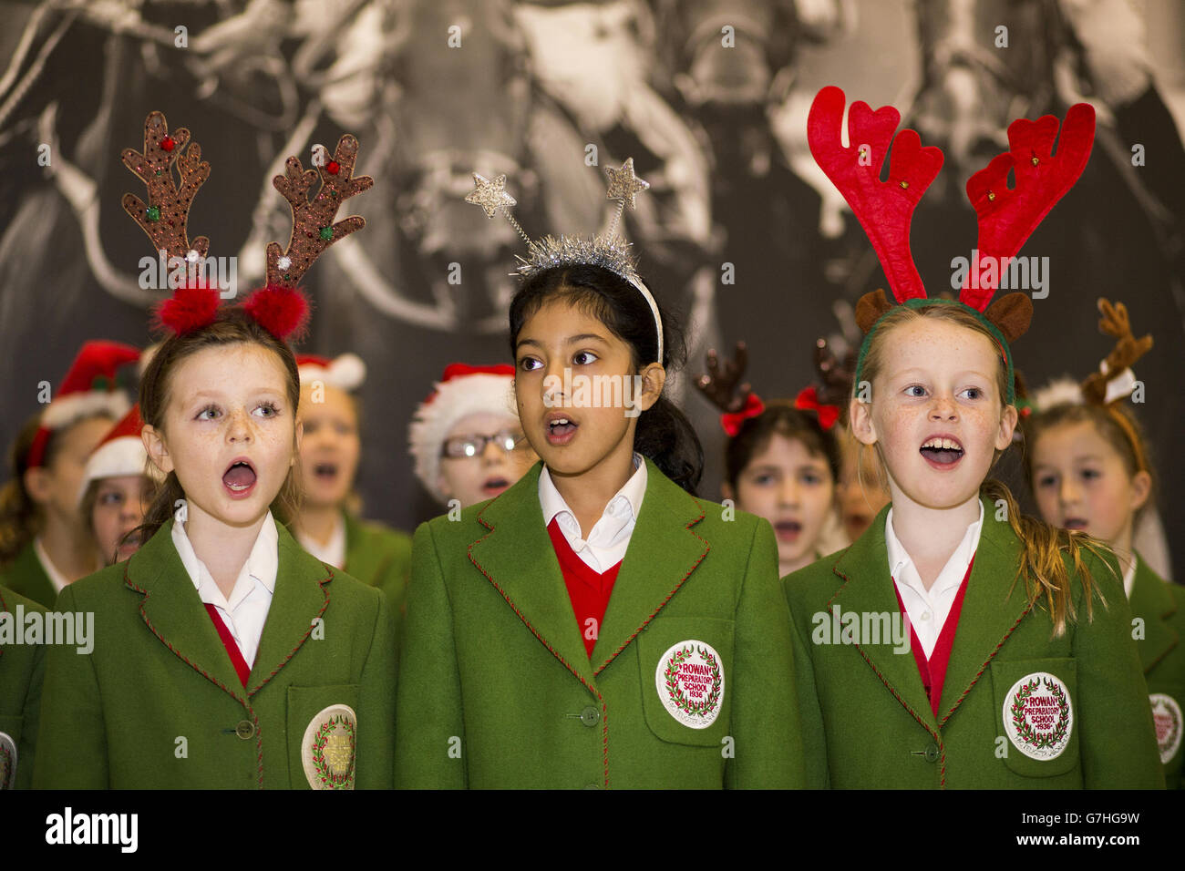 Pupils from Rowan Prep school choir sing for racegoers as they arrive ...