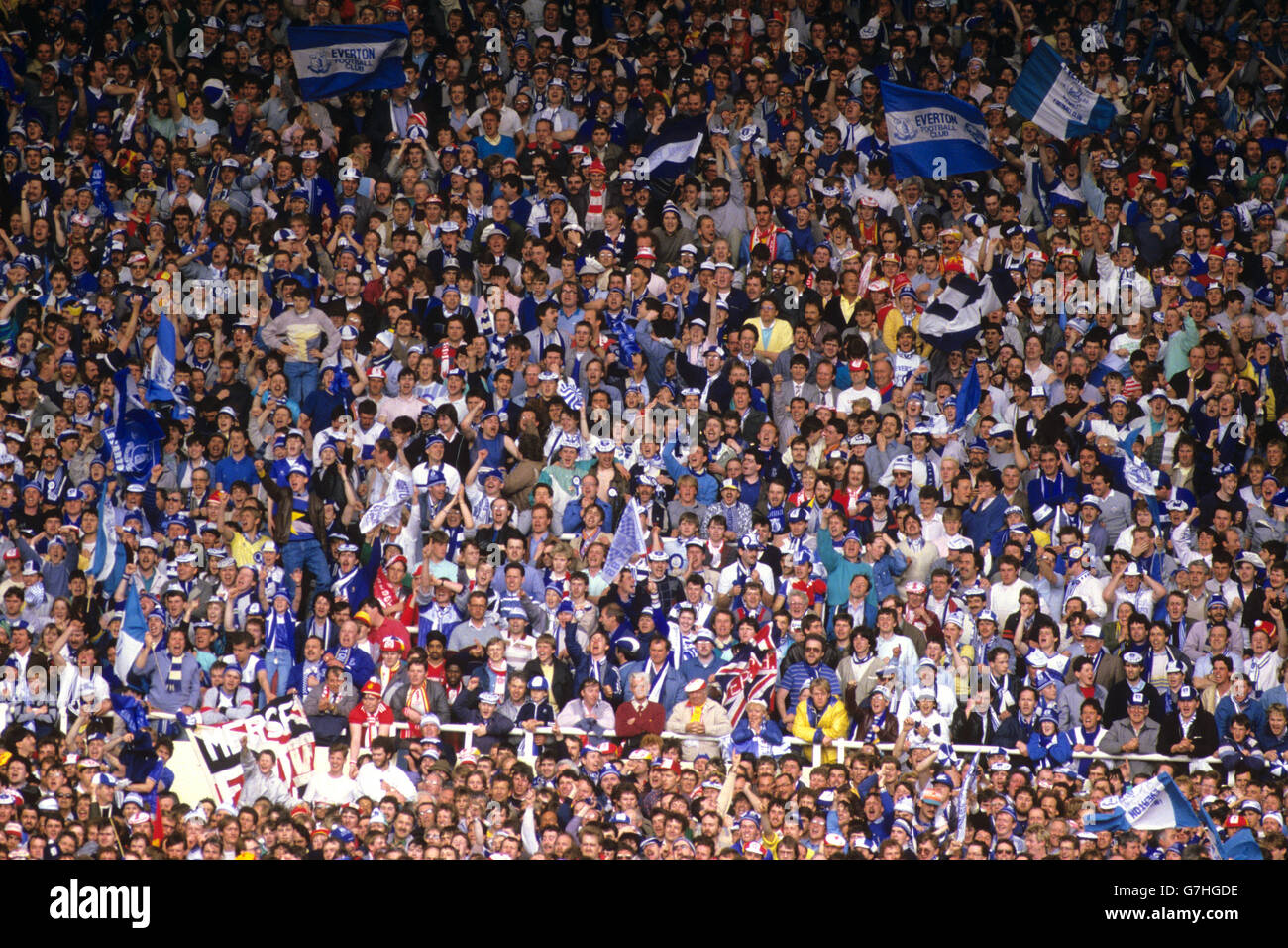 Waving flags in wembley stadium terracing hi-res stock photography and ...
