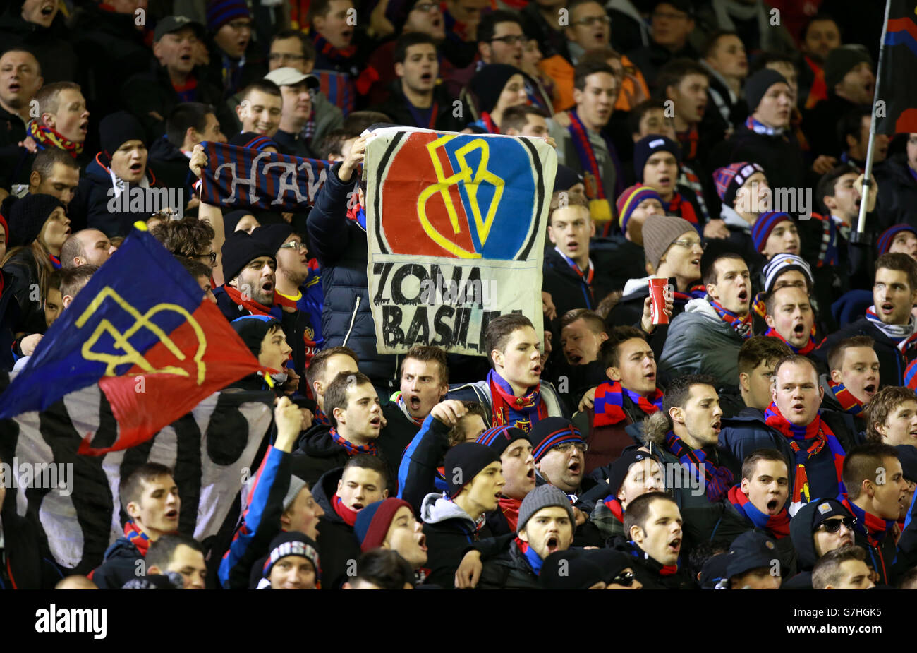 Fc basel fans cheer on their side in the stands hi-res stock ...