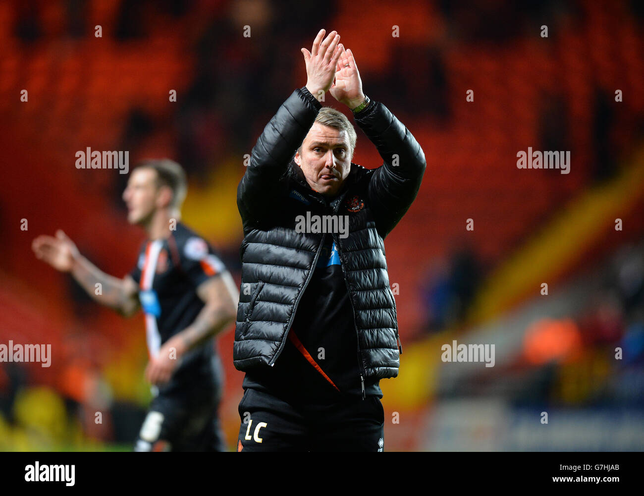 Blackpool's manager Lee Clark applauds the fans at the end of the match ...