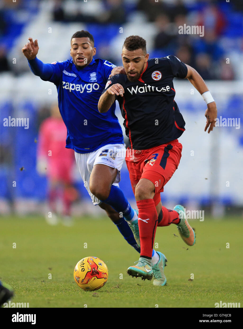 Birmingham City's David Davis (left) and Reading's Daniel Williams ...
