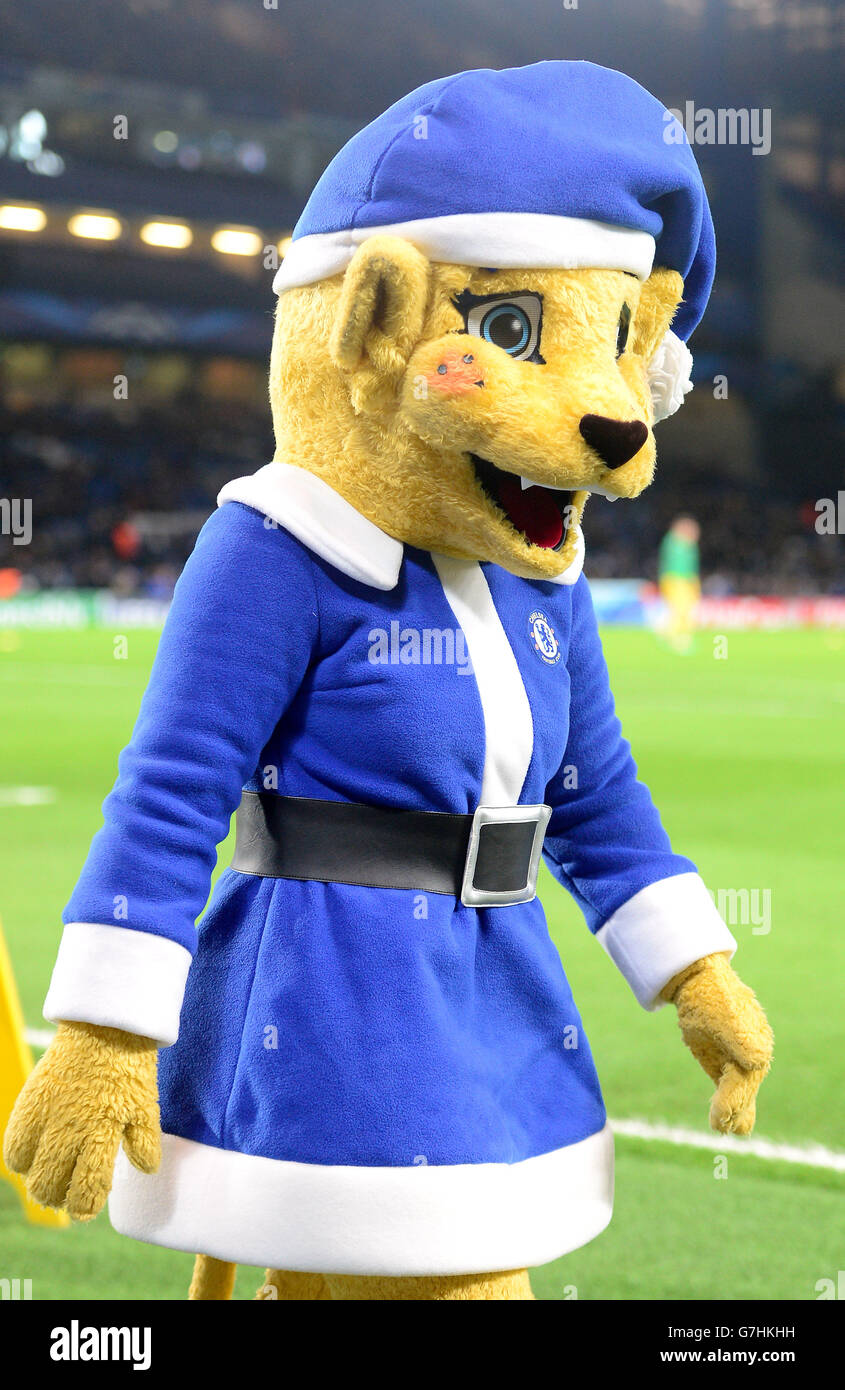 Chelsea mascot bridgette the lioness in a blue santa suit hi-res stock ...