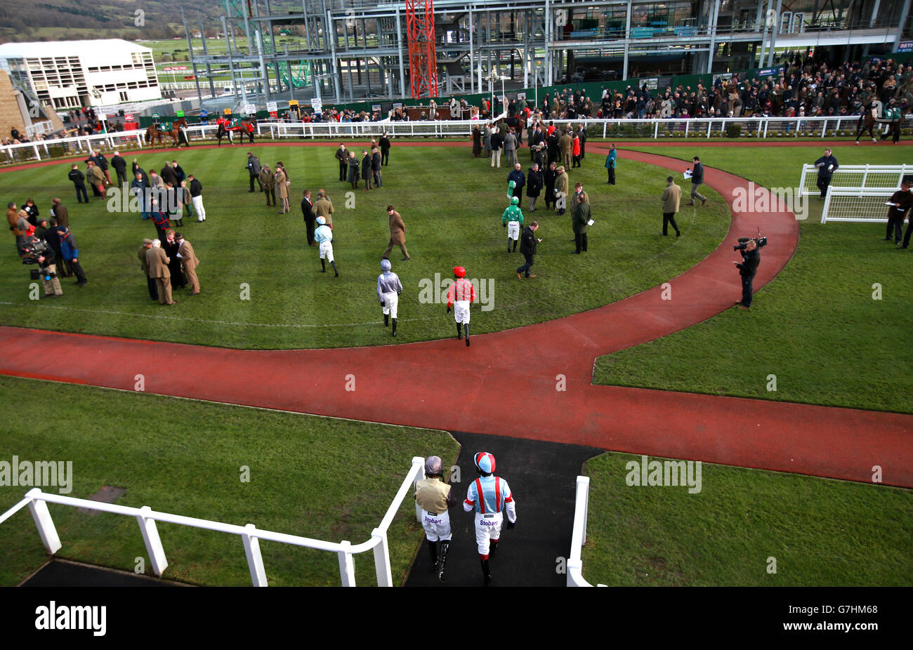 Joeckeys enter the parade ring at Cheltenham Racecourse Stock Photo - Alamy