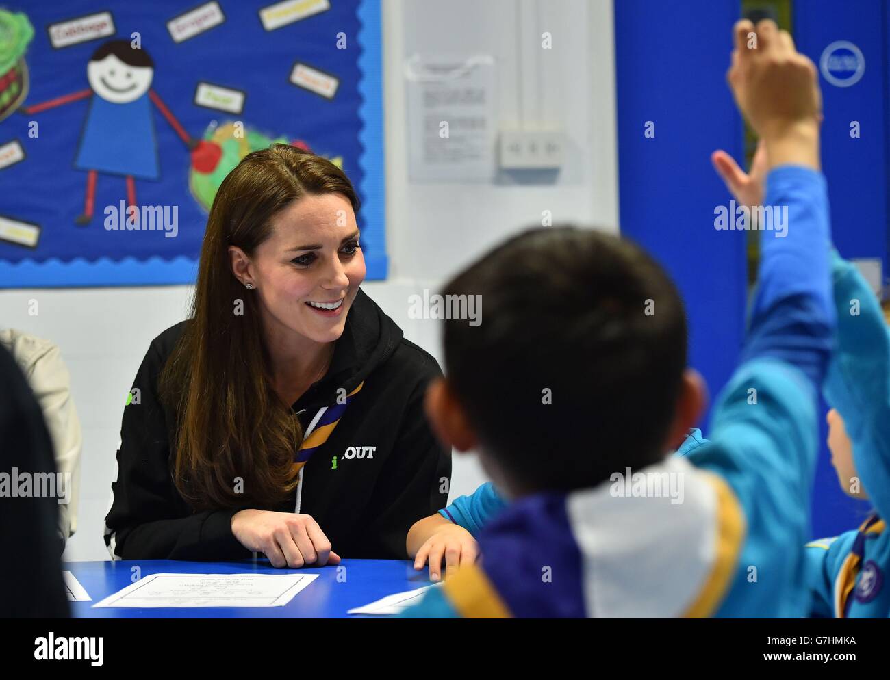 The Duchess of Cambridge learning sign language as she meets with ...