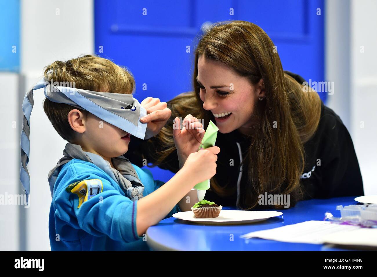 The Duchess of Cambridge helps blindfolded Fynley Gooch, aged seven ...