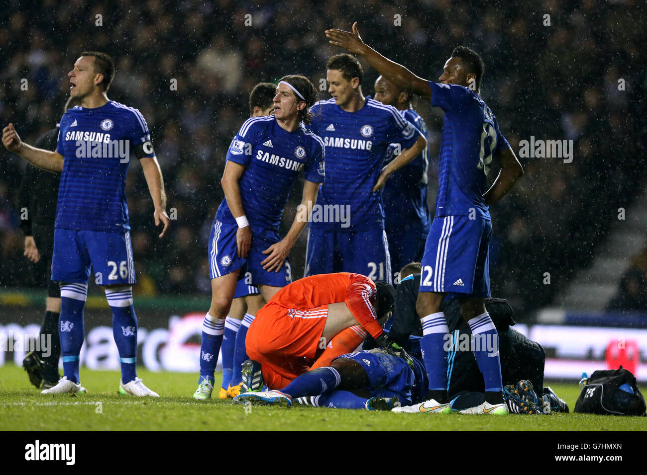 Chelsea's Kurt Zouma is tended to by the Chelsea medical staff after a ...